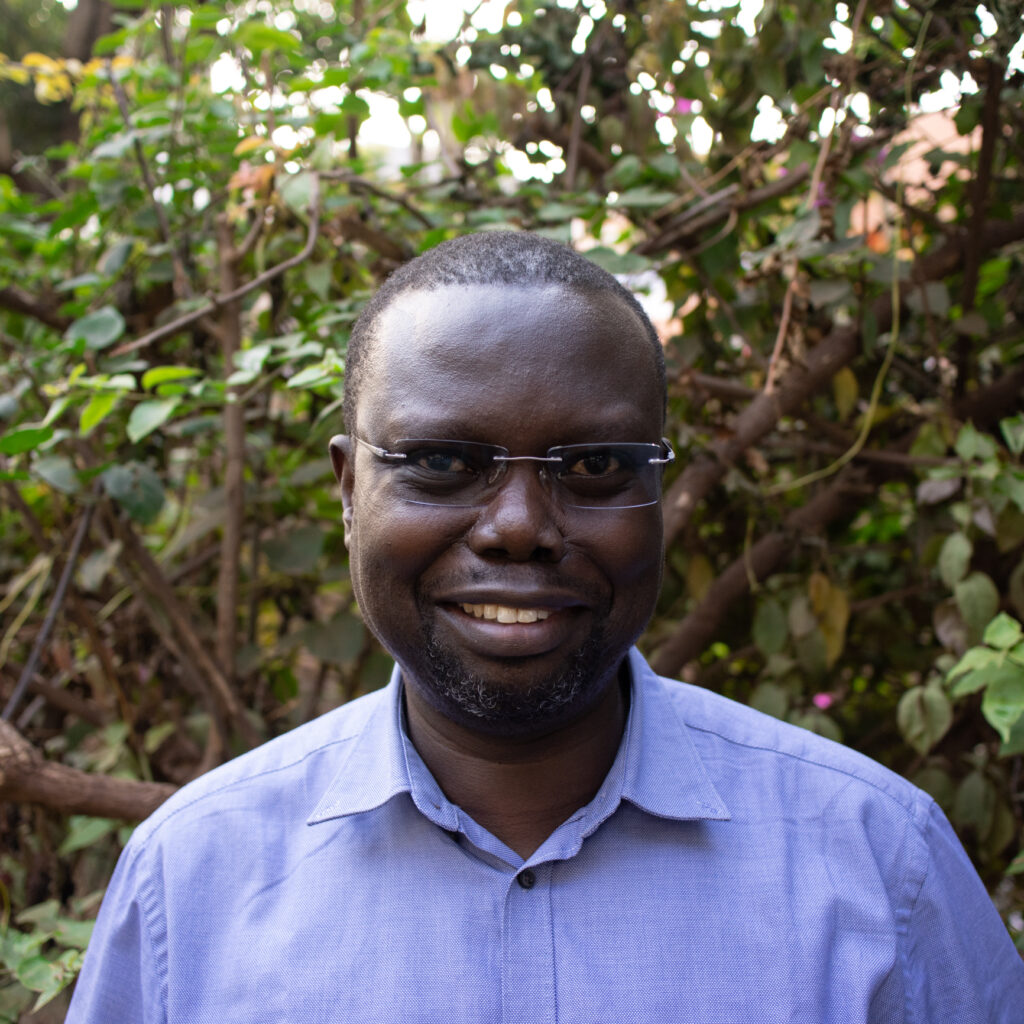 Charles Mbeeta Businge - Raising Voices